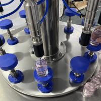 China Semi-automatic perfume rotary filling machine for sale