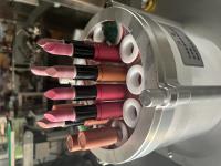 China Automatic sprinkle beautiful gold powder machine for lipstick for sale