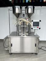 China Two-color screw lipgloss heating filling machine for sale