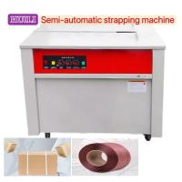 China 9mm-15mm Width Strap Semi Automatic Box Strapping Machine Flip Up Desktop Design for sale