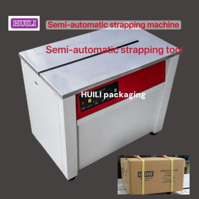 China Semi-automatic strapping machine 12mm PP strap Automatic packaging machine  for sale
