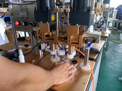 China Multifunction 4 Wheel Screw Capping Machine For Plastic Bottles for sale