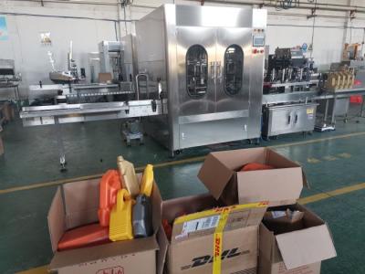 China 4000BPH Brake Oil Filling Bottle Cap Packing Machine for sale