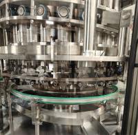 China High Speed Efficient Drink Can Filling Machine, 24 Filling Heads, Made Of Stainless Steel for sale
