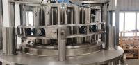 China 9 Heads Stainless Steel Automatic Can Filling Machine, 150 Cans/Min, Piston Filler for sale