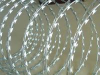 China Galvanized Security Fencing Razor Barbed Wire With Clips Cross for sale