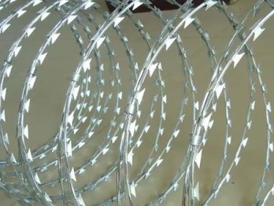 China Galvanized Security Fencing Razor Barbed Wire With Clips Cross for sale