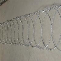 China BTO-22 Galvanized 90cm Coil Diameter Concertina Razor Barbed Wire for Protection Wall for sale