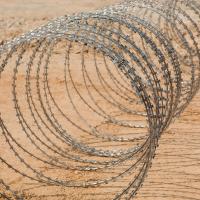 China BTO-22 CBT-65 Concertina wire galvanized blade wire stainless steel razor barbed wire wall fence for sale