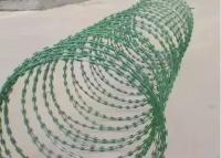 China Single Coil Concertina Razor Barbed Wire Barbed Dark Green Wire Of Painted Iron for sale