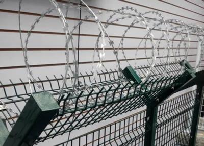 China Hurricane Fence Razor Concertina Barbed Wire Single Coil CBT-60 for sale