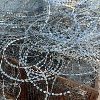 China Galvanized Anti-Climbing Security Fence with BTO-22 Concertina Razor Barbed Wire for sale