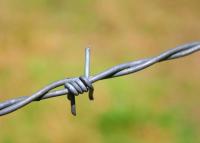 China Use Of Prison Walls Single Strand Stainless Steel Barbed Wire Price Per Roll for sale