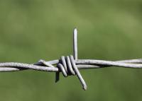 China Use Of Prison Walls Double Strand Traditional Twist Galvanized Barbed Wire Coils for sale