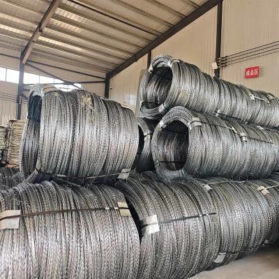 China Hot-Dip Galvanized Blade Barbed Wire Razor Barbed Wire Farm Security Anti Climbing for sale