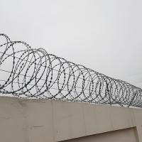 China Hot Dip Galvanized Cross Razor Barbed Wire BTO-22 for High Security Fencing for sale