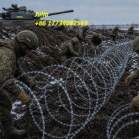 China Galvanized Razor Barbed Wire With Concertina Style Loops And Sharp Blades For Security Barriers And Easy Installation In Various Settings for sale