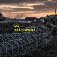 China Galvanized Razor Barbed Wire With Concertina Style Loops And Sharp Blades For Security Barriers And Easy Installation In Various Settings for sale