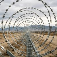 China Stainless Steel Razor Barbed Wire CBT-65 Concertina Wire for Residential Farm Safety for sale