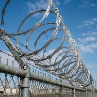 China Plate thickness 0.3 millimeter sharp razor barbed wire used in perimeter fencing security and high safety boundary installations for sale