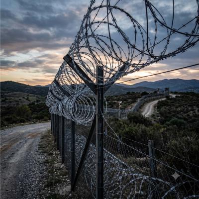 China High Security Razor Ribbon Barbed Wire Coils for Border Wall and Airport Fence Protection for sale