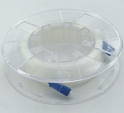 China FTTH Clear Fiber Drop Cable 0.9mm Tight Buffered G657A2 SC/UPC-SC/UPC 100m for sale