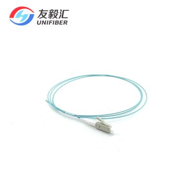 China LC/PC OM3 OM4 Multimode Fiber Optic Pigtail 0.9mm Tight Buffer Aqua LSZH 1m for sale