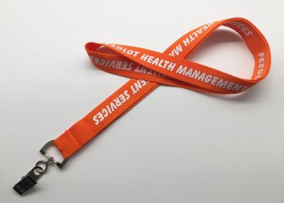 China Durable Bright orange color  custom silk screen polyester lanyard with bulldog. for sale