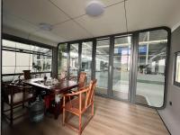 China Custom Prefabricated Apple Cabin House Kiosk 15,000 sqm Facility with 50+ Monthly Production Capacity for sale