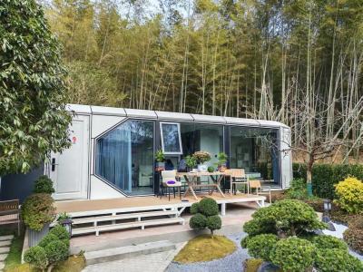 China Luxury Prefabricated Capsule House 11.5x3.4x3.4m with Balcony and Galvanized Steel Frame for sale