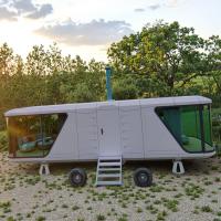 China Space Capsule House 11.5m x 3.3m Prefabricated Tiny Home with 40-Year Structure Life for sale