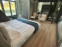 China 10 Ton Luxury Mobile Capsule House with Kitchen and Balcony - 38 sqm Compact Living Space with Smart Control System for sale