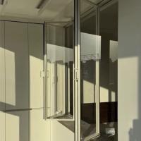 China Aluminum Alloy Folding Windows Doors UV Protection Stainless Steel Modern Design for Residential Kitchen Use 5+ Year Warranty for sale