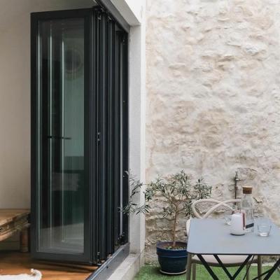 China YATTON High Quality Customized Thermal Break Folding Doors Double-layer Insulated Tempered Glass Modern Design 5-Year Warranty for sale