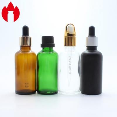 China 50ml Clear Amber Blue Green Essential Oil Cosmetic Glass Bottle Vial for sale