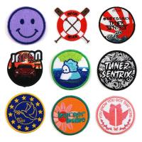 China Custom Embroidered Iron On Patches Merrow Border 9 Colors Free Design for Clothing for sale