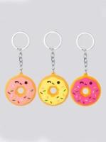China Custom Candy Colors PVC Key Chain Donut Cartoon Soft Rubber Keychain 2D 3D Logo for sale
