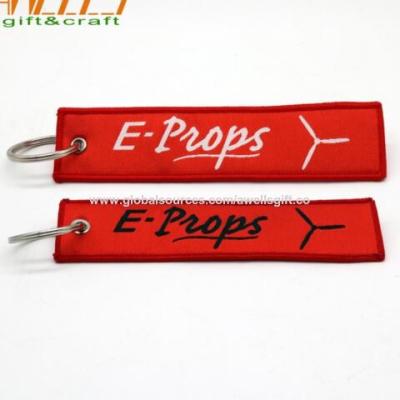 China Custom Woven Polyester Keychain 130x30mm Promotional Fabric Tag with Durable Merrowed Border for sale