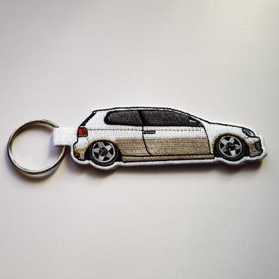 China Custom Embroidered Keychain 100pcs MOQ Polyester Cotton Remove Before Flight Keychain for sale