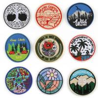 China Custom Round Embroidery Patch Wild Flower Camp Painting Clothing Decoration 100 PCS MOQ for sale