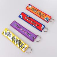 China Custom OEM Cute Creative Embroidered Name Keychains Twill Fabirc With Merrow Border for sale