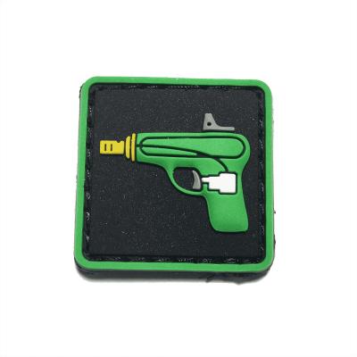 China Custom 3D PVC Rubber Patch Emoji Water Pistol Design Durable Flexible for sale