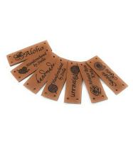 China Custom Embossed Leather Sew On Labels for Clothing Garment Tags OEM for sale