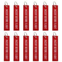 China Small ODM Flight Tag Keychain Custom Portable Red Embroidered Bulk Packaging for sale