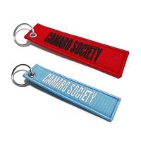 China Custom Embroidered Keychain 130x30mm Bulk Pack Remove Before Flight Cotton Keychain for sale
