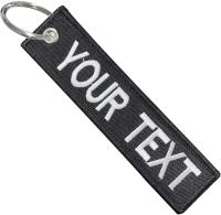 China Custom Embroidered Remove Before Flight Keychain 130x30mm Nylon Promotional Gift for sale