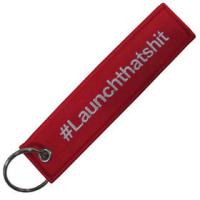 China Custom Embroidered Remove Before Flight Keychain Red 130x30mm Nylon 100 Pieces MOQ for sale