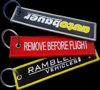 China Custom Embroidered Remove Before Flight Keychain 130x30mm Durable Cotton for sale