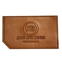 China Custom Embossed PU Leather Labels Sew On Adhesive Iron On Logo Patch 7-15 Days Lead Time for sale