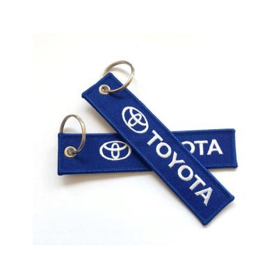 China Custom Embroidered Keychain 130x30mm Cotton Double Side Car Gift Logo for sale